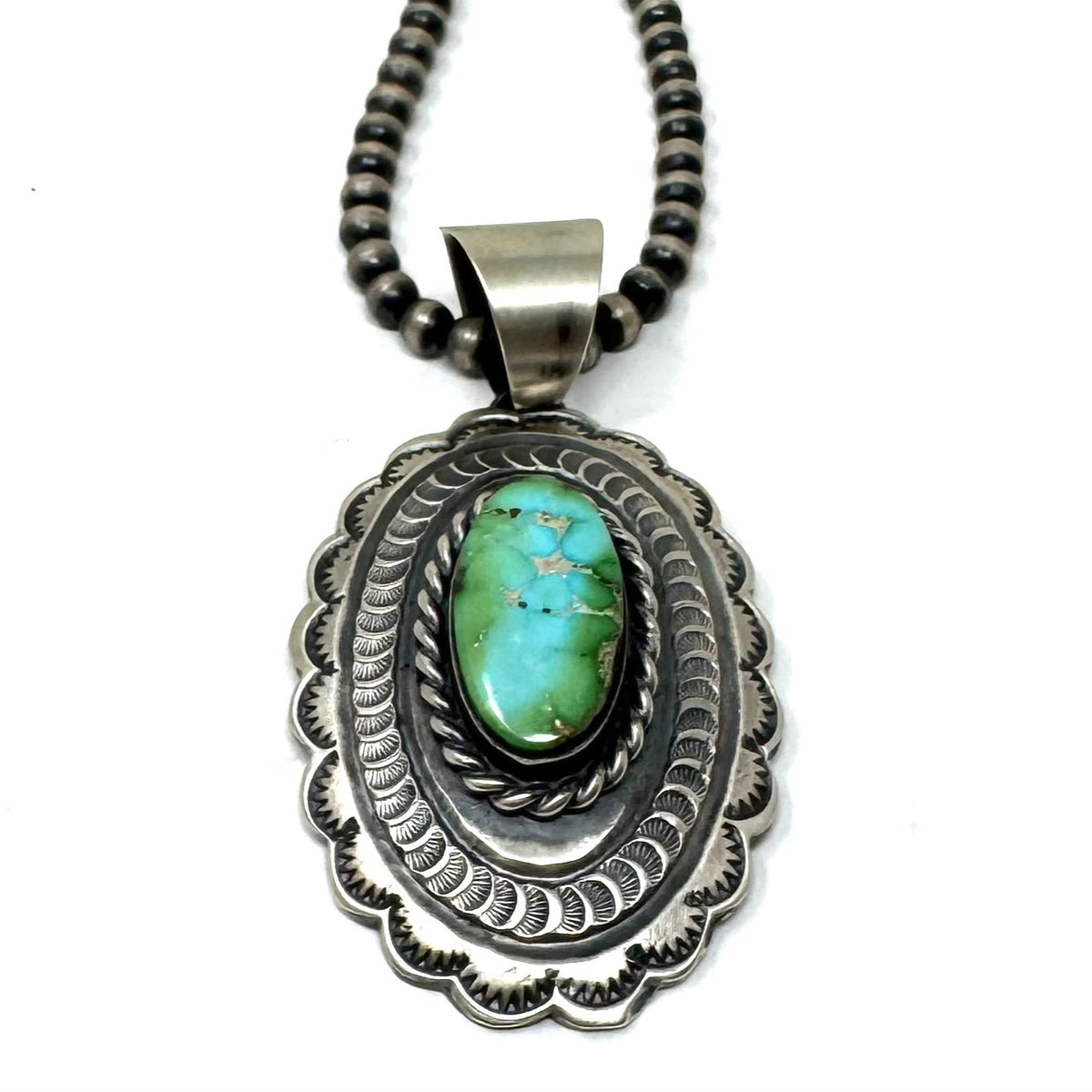 CB 38 XL TURQUOISE OVAL NATIVE STAMP PENDANT – Blanca Flor Silver Jewelry